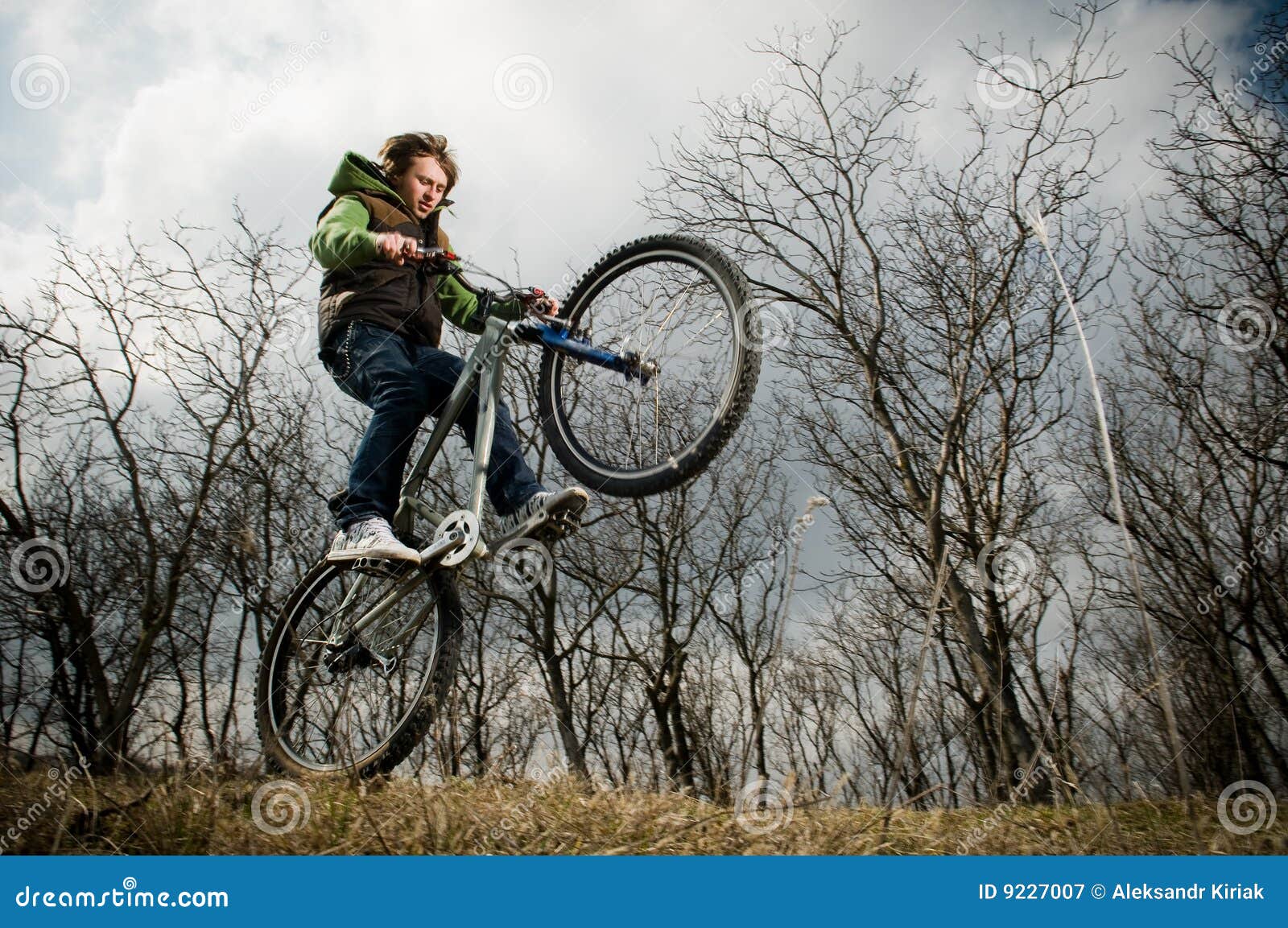 Young man riding bike stock image. Image of lifestyle - 9227007