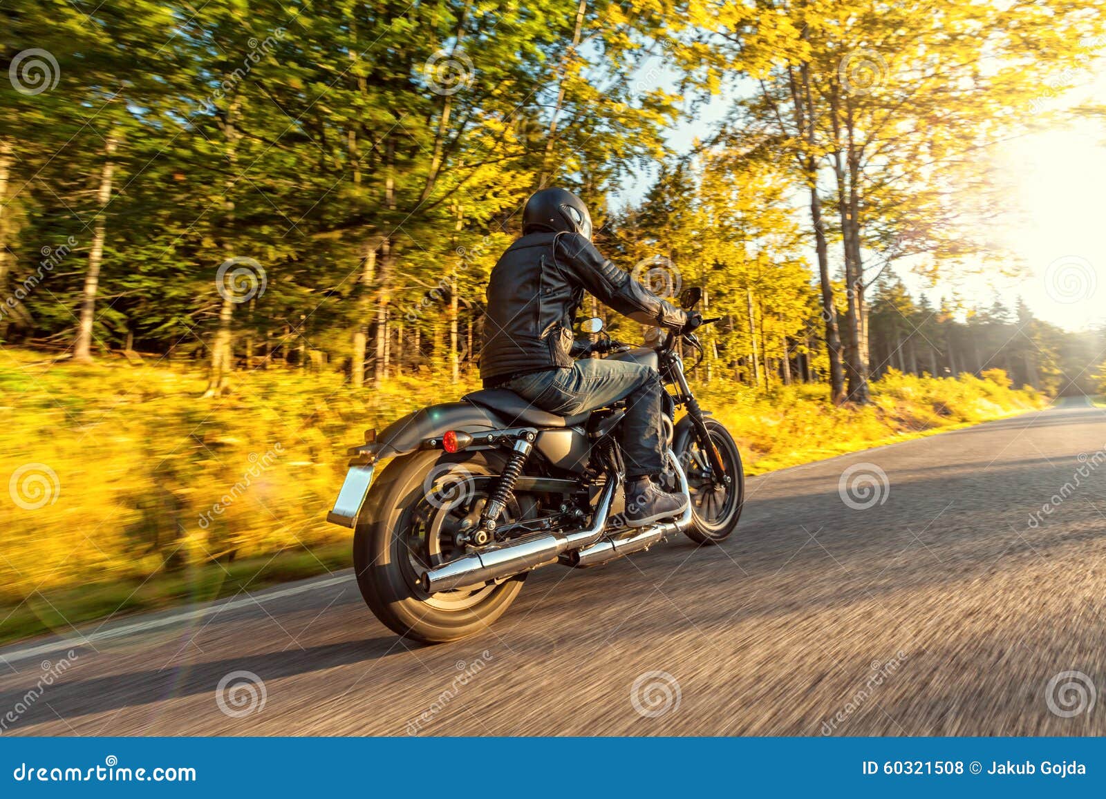 A Young Man Riding a Chopper on a Road Stock Photo - Image of bike ...