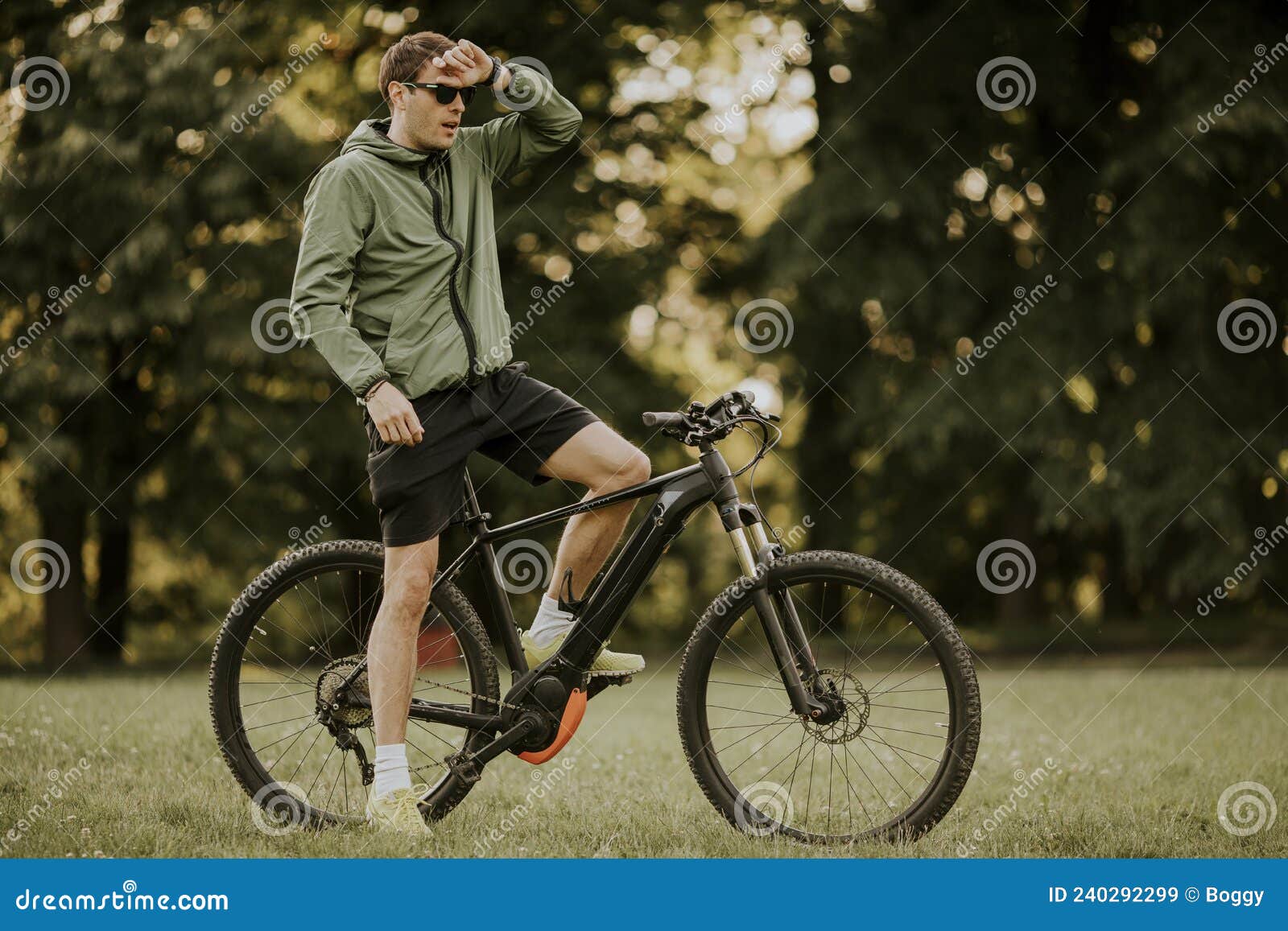 Young Man Riding Ebike in Nature Stock Image - Image of nature, ecology ...