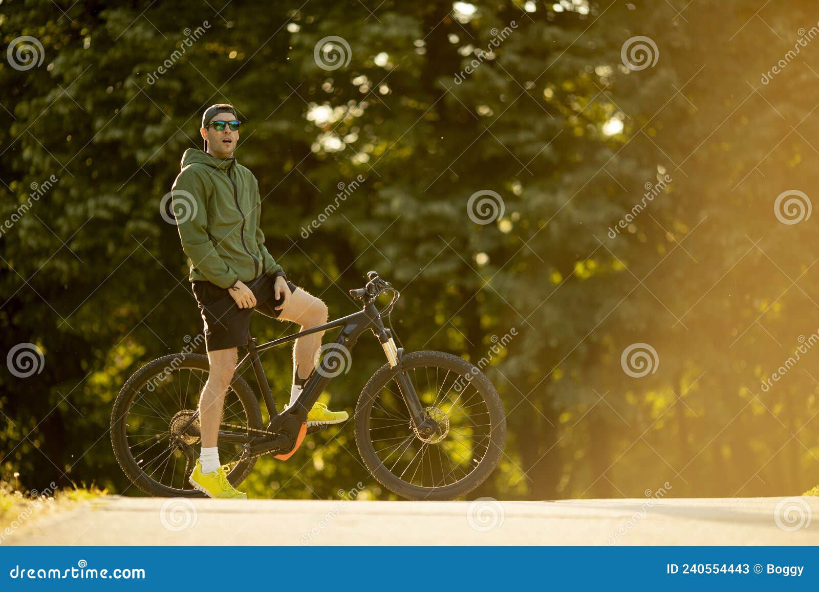 Young Man Riding Ebike in Nature Stock Image - Image of male, equipment ...