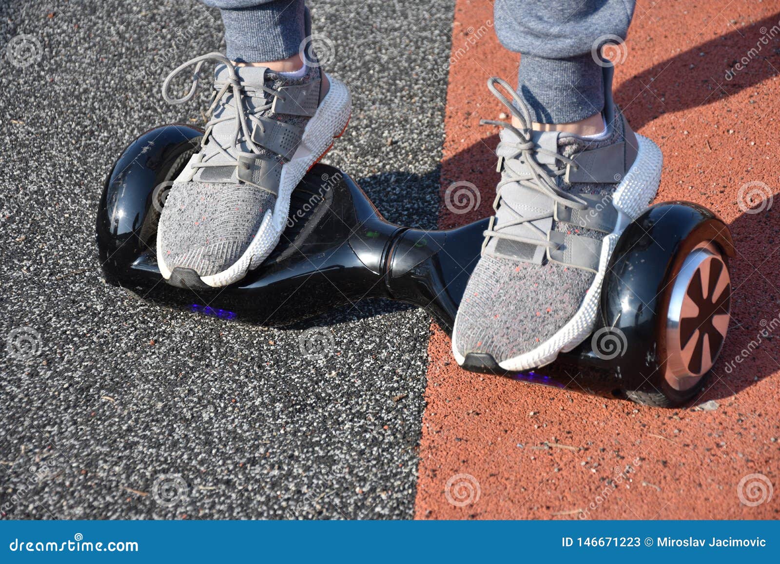 Young Man Riding on the Hoverboard in the Park Stock Image - Image of ...