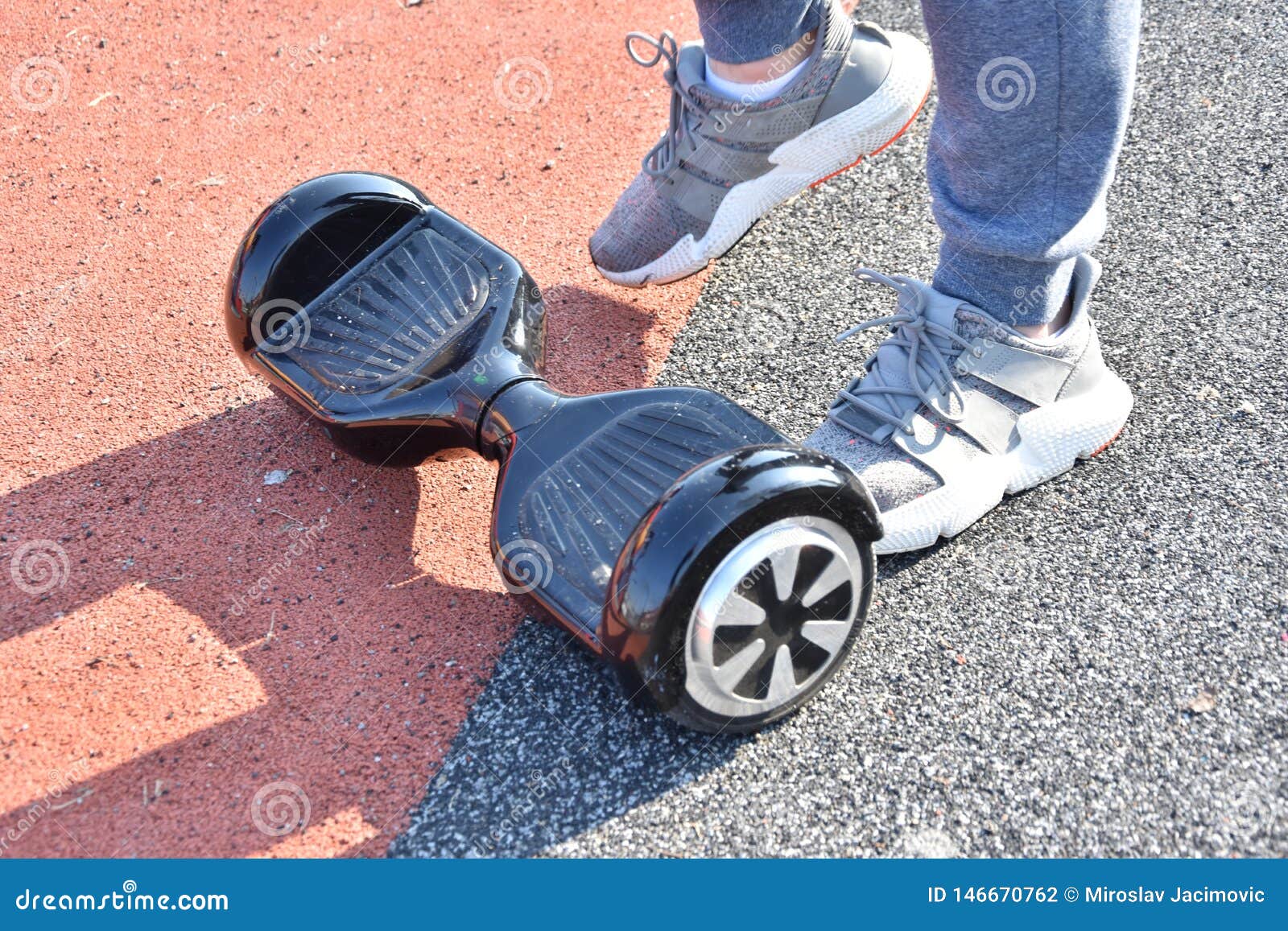 Young Man Riding on the Hoverboard in the Park Stock Photo - Image of ...