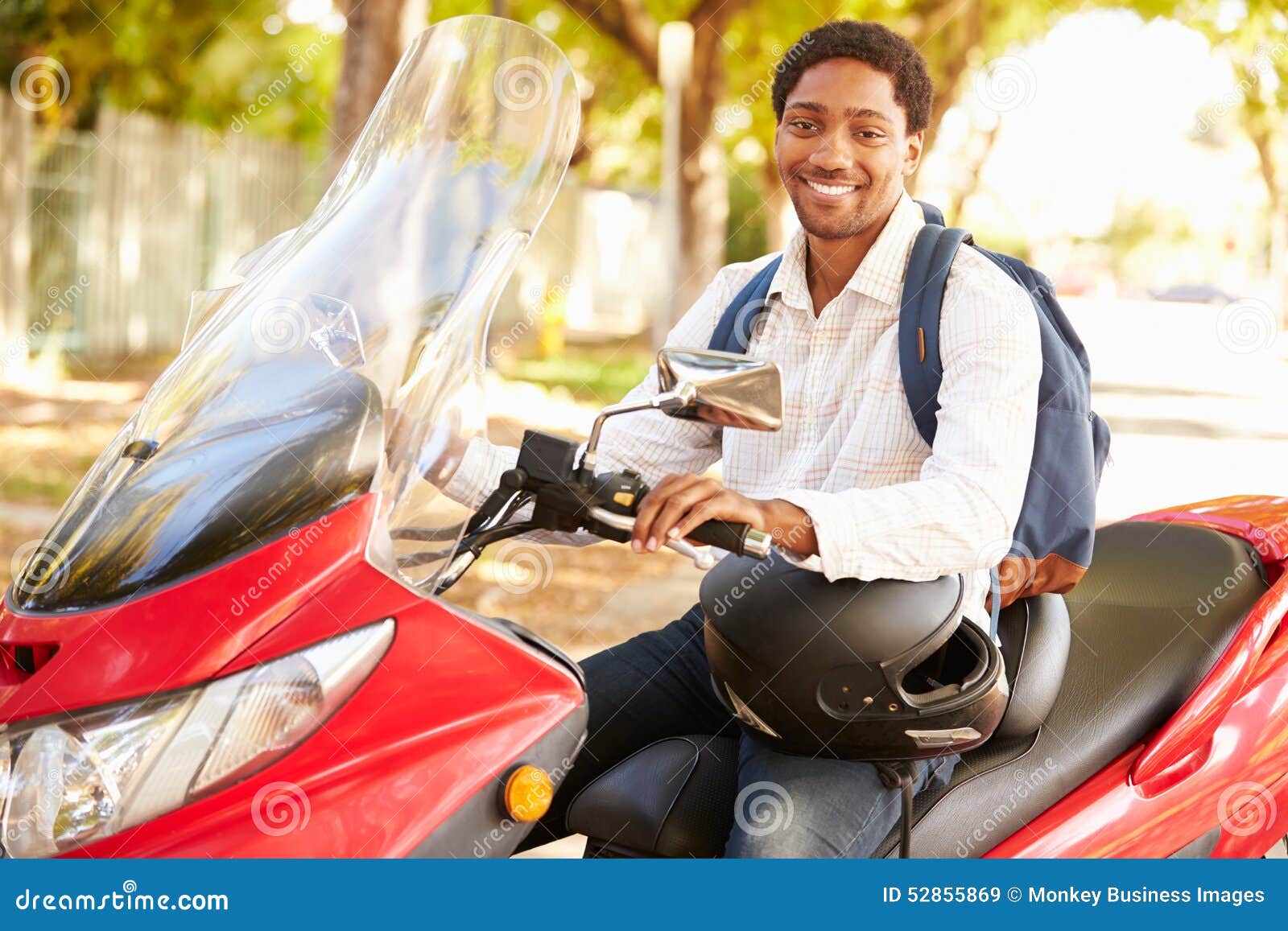 Young Man Riding Motor Scooter To Work Stock Image - Image of happy ...