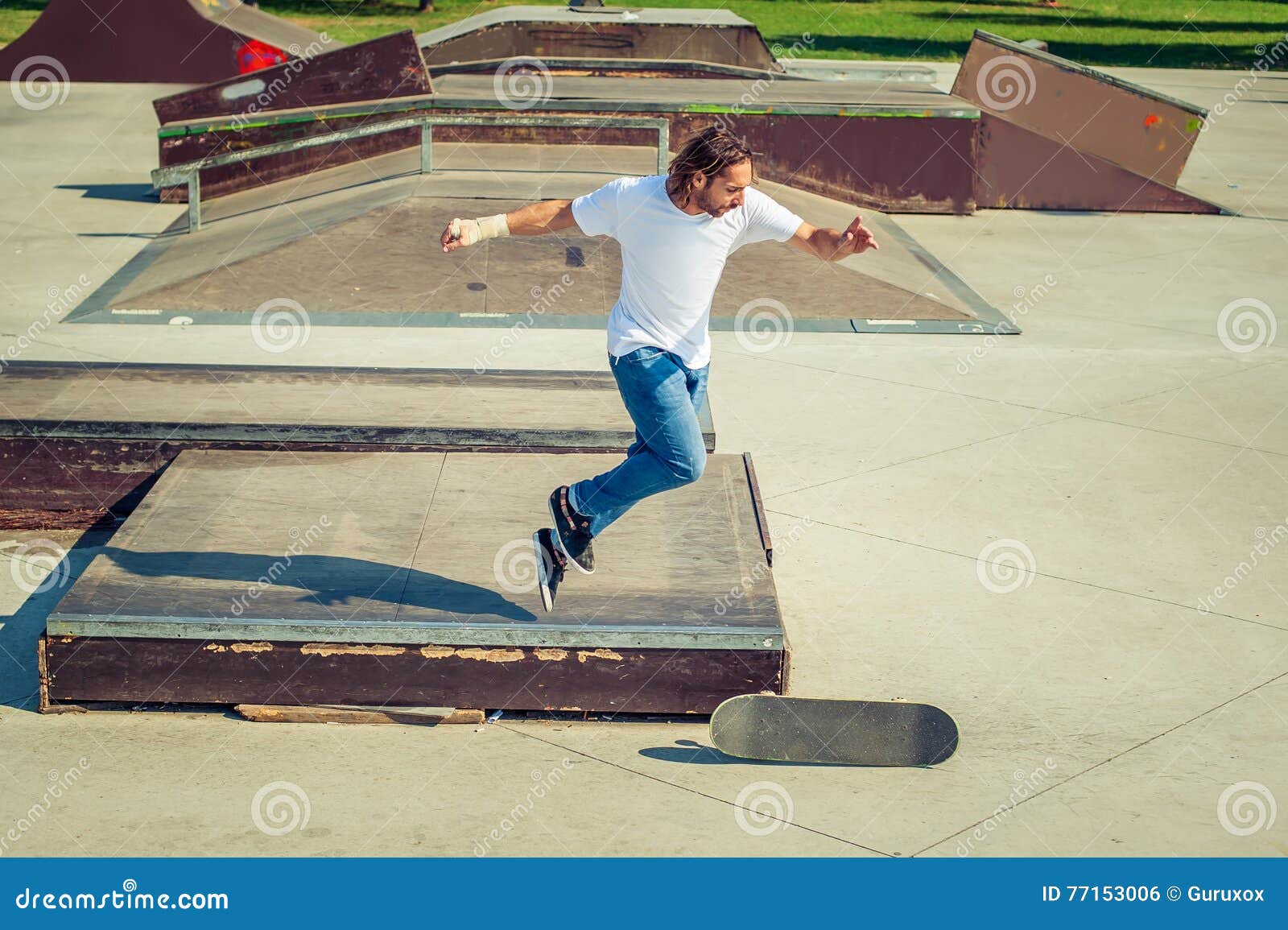 Young Man Riding Skate at Park and Falling Down Stock Photo - Image of ...