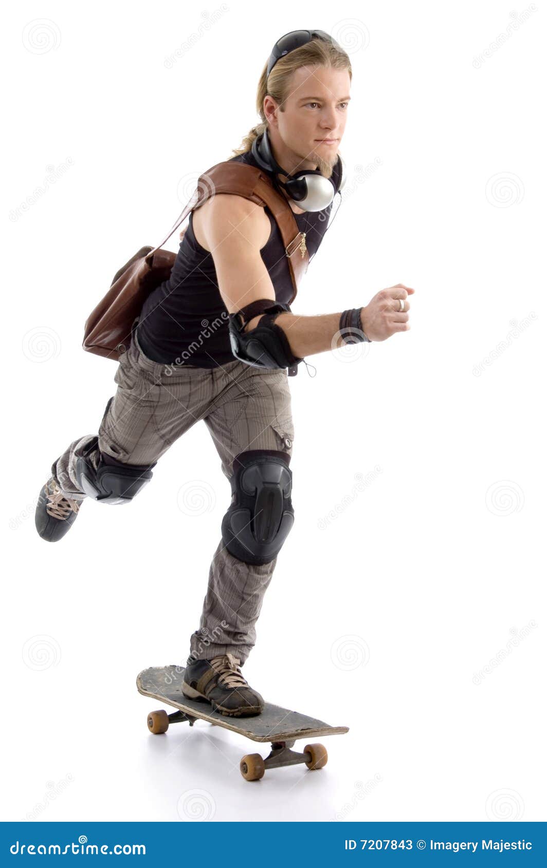 Young Man Riding A Skateboard Stock Image - Image: 7207843