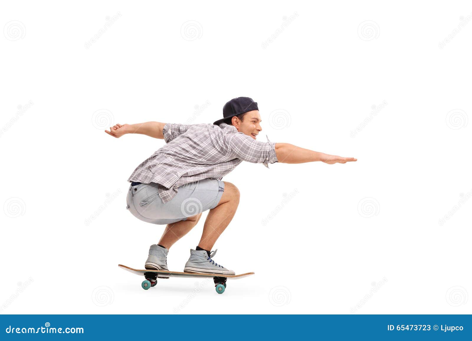 Young Man Riding a Skateboard Stock Image - Image of moving, fast: 65473723