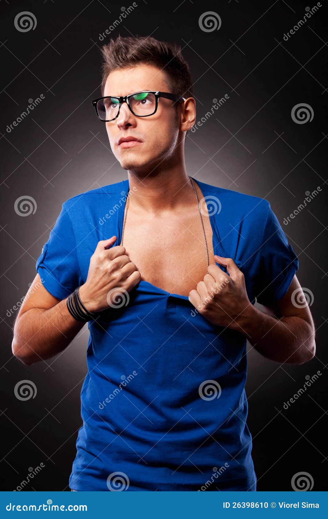 Young Man Ripping His Blue Shirt Stock Photo - Image of model, away ...