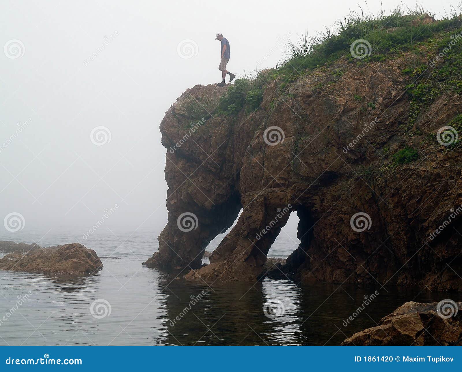 Young man on the rock stock photo. Image of desolate, rocks - 1861420