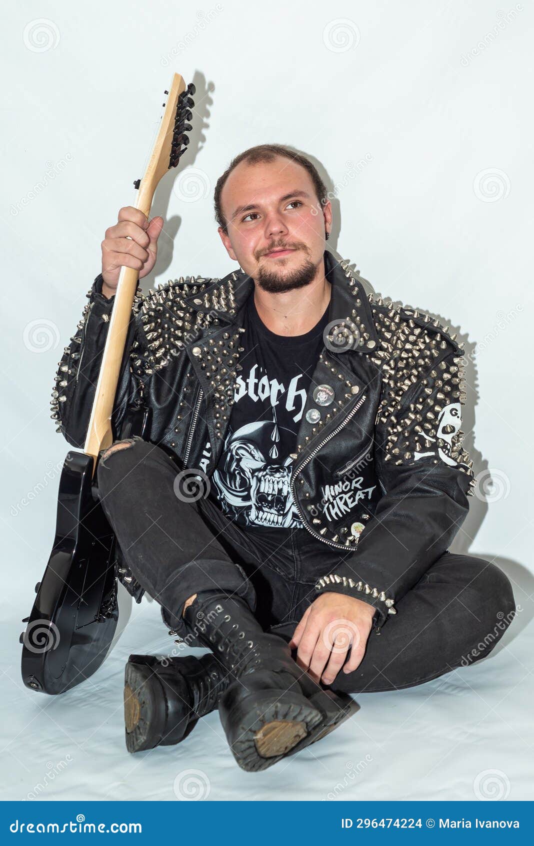 A Young Man in Rocker Clothes with a Guitar. Rocker. Stock Photo ...