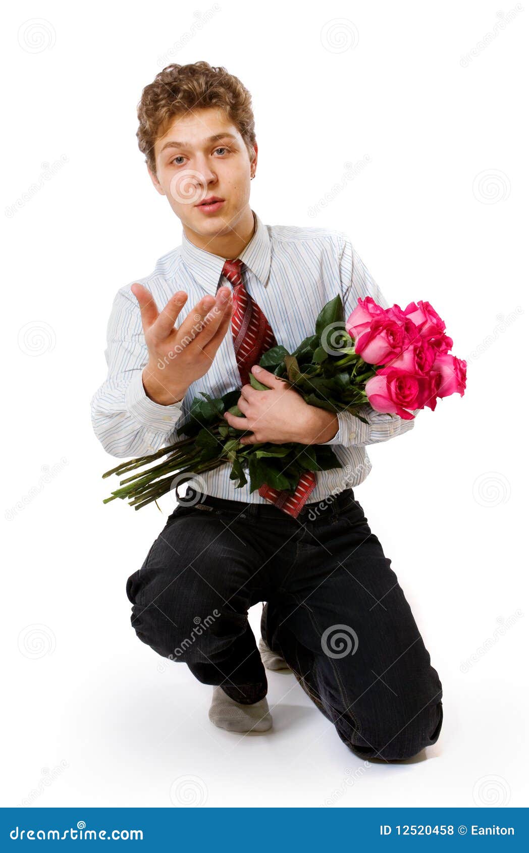 Young man with roses stock photo. Image of proposition - 12520458