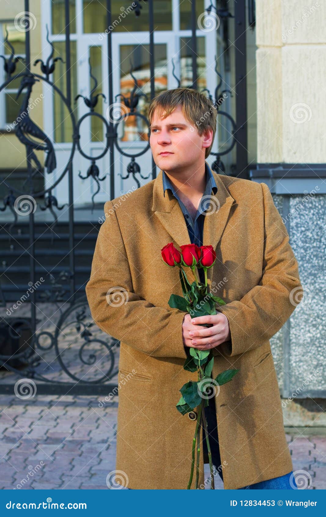 Young man with a roses. stock image. Image of together - 12834453