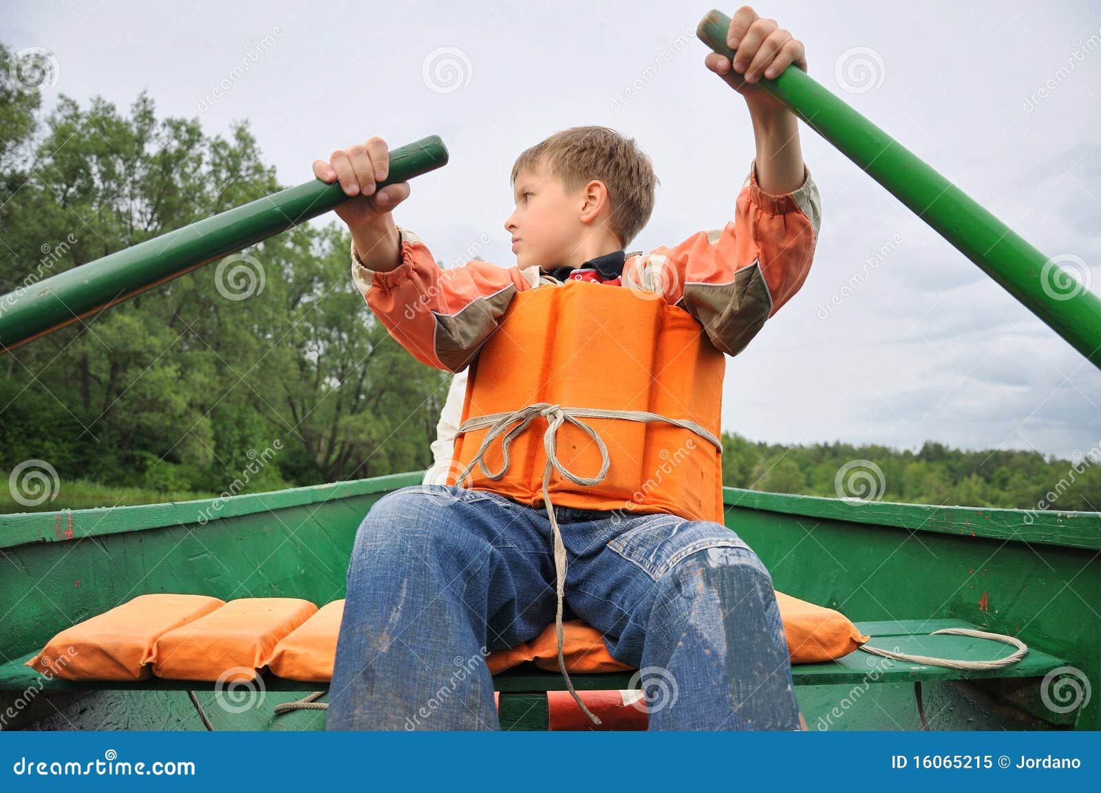 Young man rowing a boat stock image. Image of rowing - 16065215