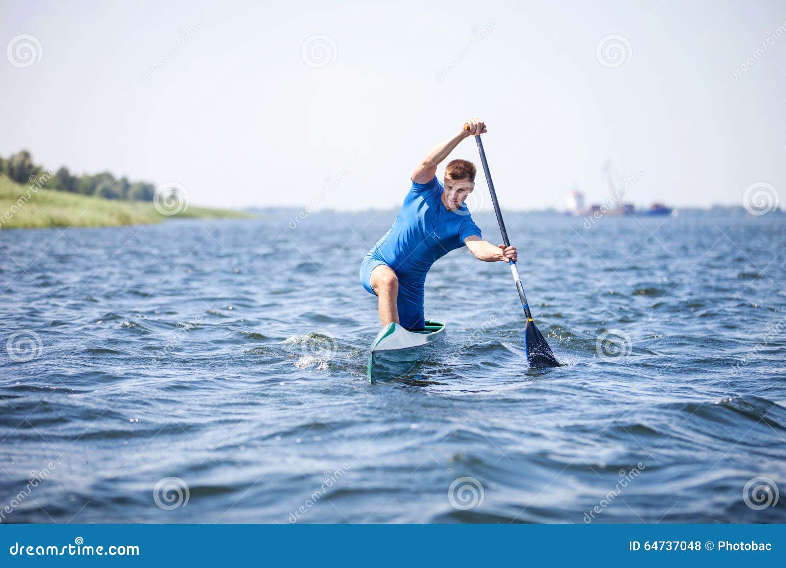 Young Man Rowing in Canoe Along a River. Stock Photo - Image of healthy ...