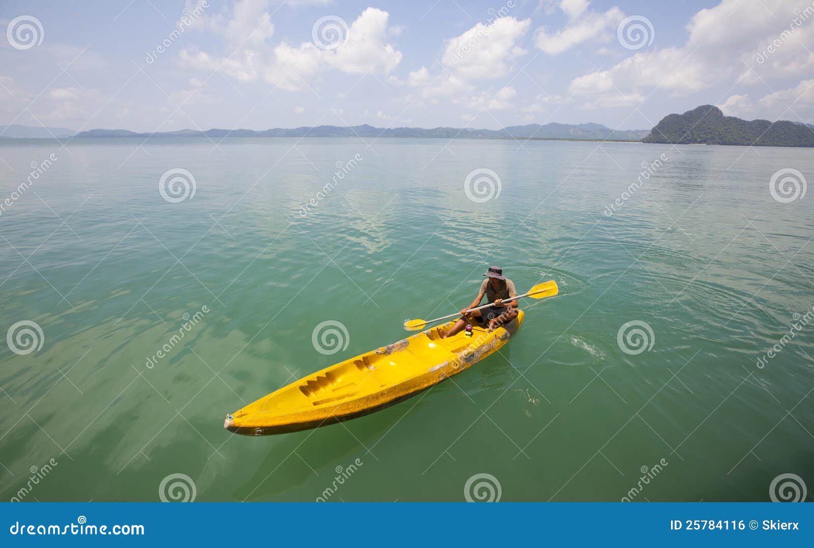 Young Man Rowing a Canoe on a Tropical Island Stock Photo - Image of ...
