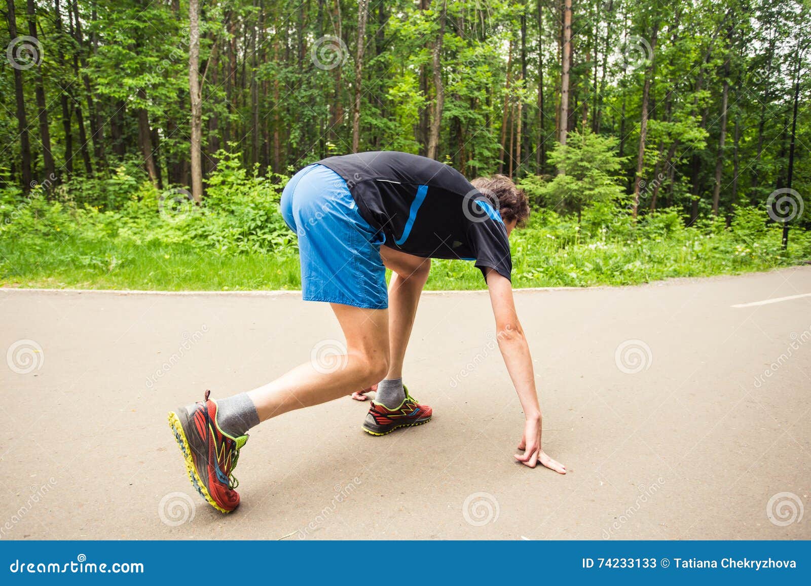 Young Man Runner Getting Ready for a Run on Track Stock Image - Image ...