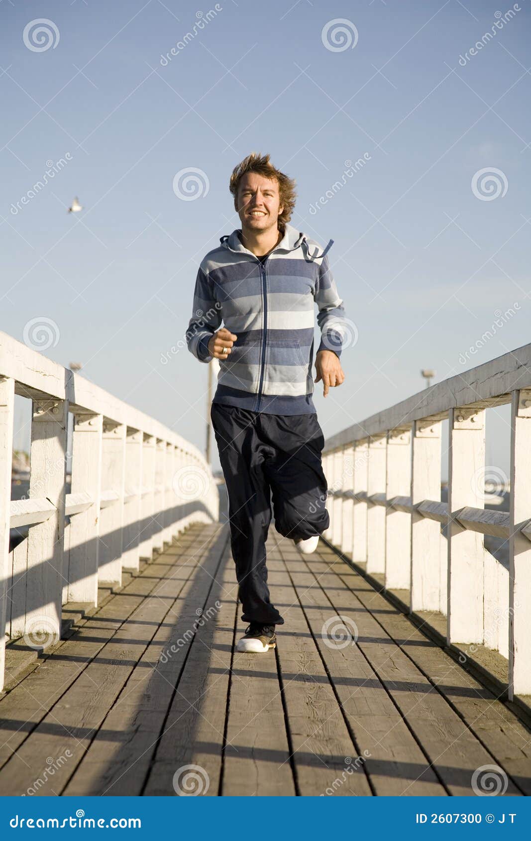 Young man running stock photo. Image of lifestyle, running - 2607300