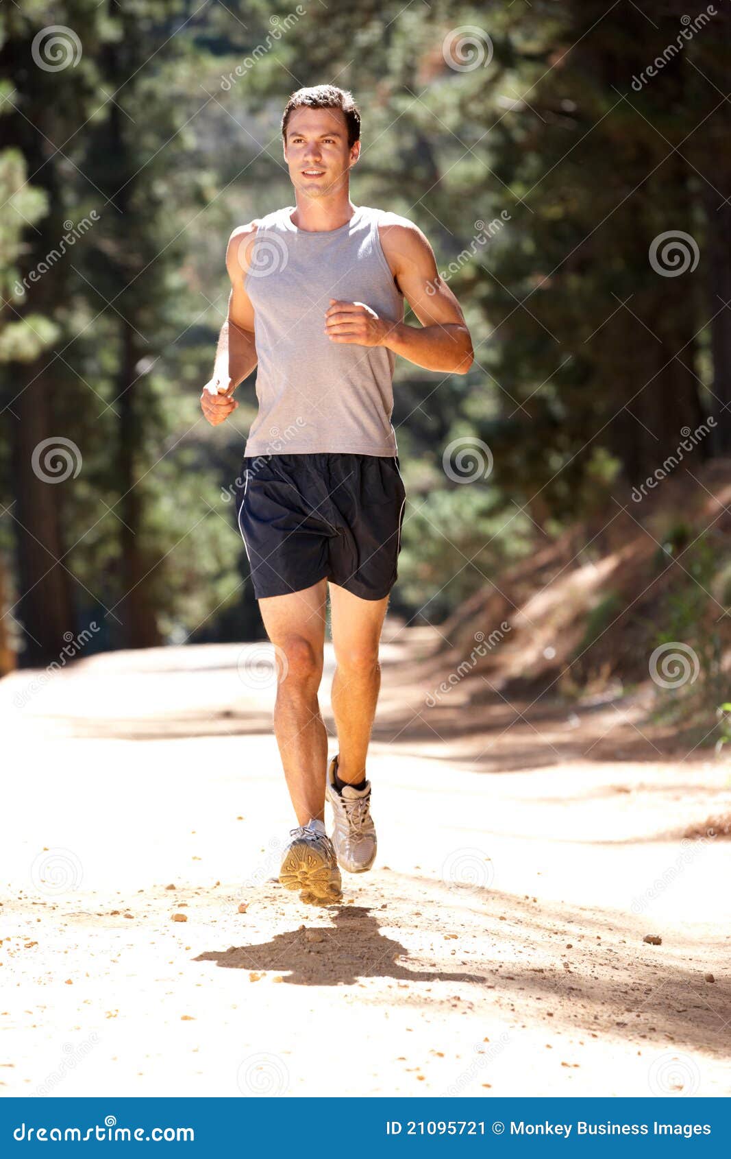 Young Man Running Along Country Lane Stock Image - Image of male ...