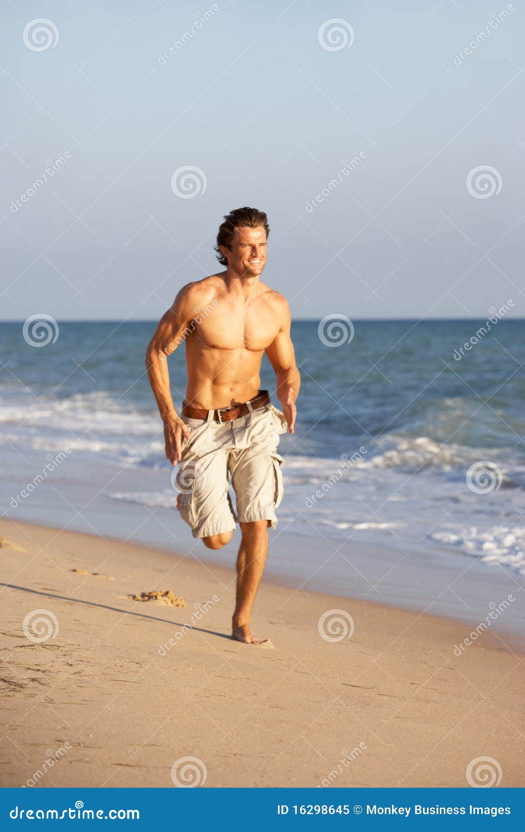 Young Man Running Along Summer Beach Stock Image - Image of seaside ...