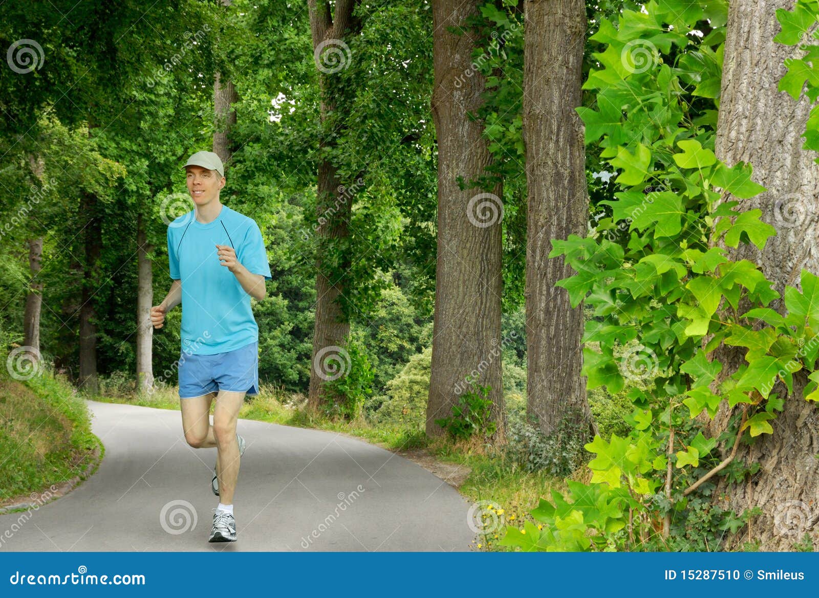 Young Man Running in a Beautiful Park Stock Photo - Image of endurance ...