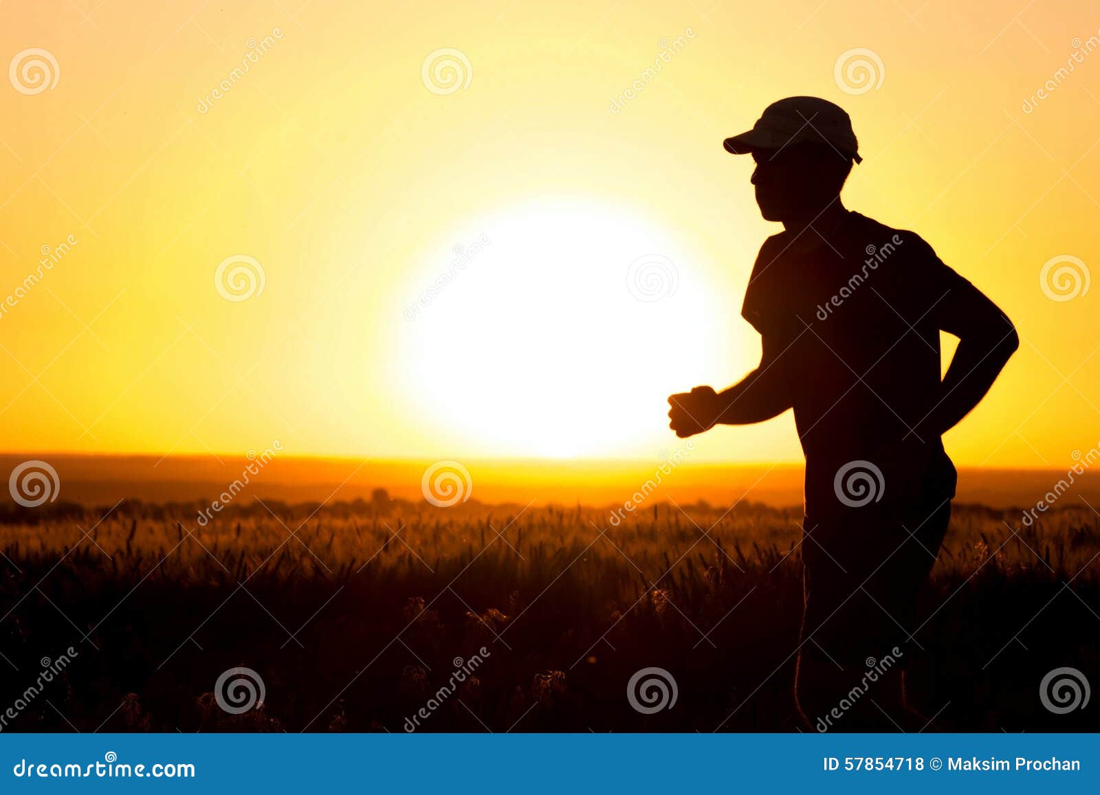 A Young Man Running in the Field Stock Photo - Image of spikes, feet ...