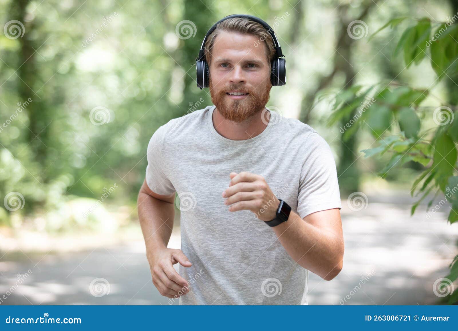 Young Man Running in Forest Stock Image - Image of legs, athletic ...