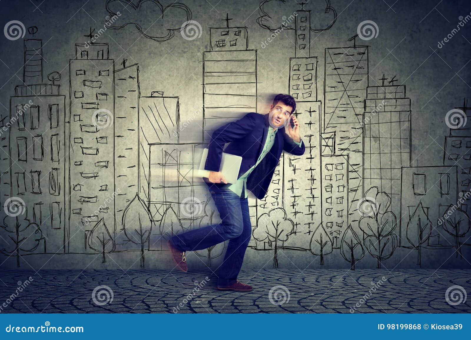 Young Man Running Late To Work Talking on Mobile Phone Stock Photo ...