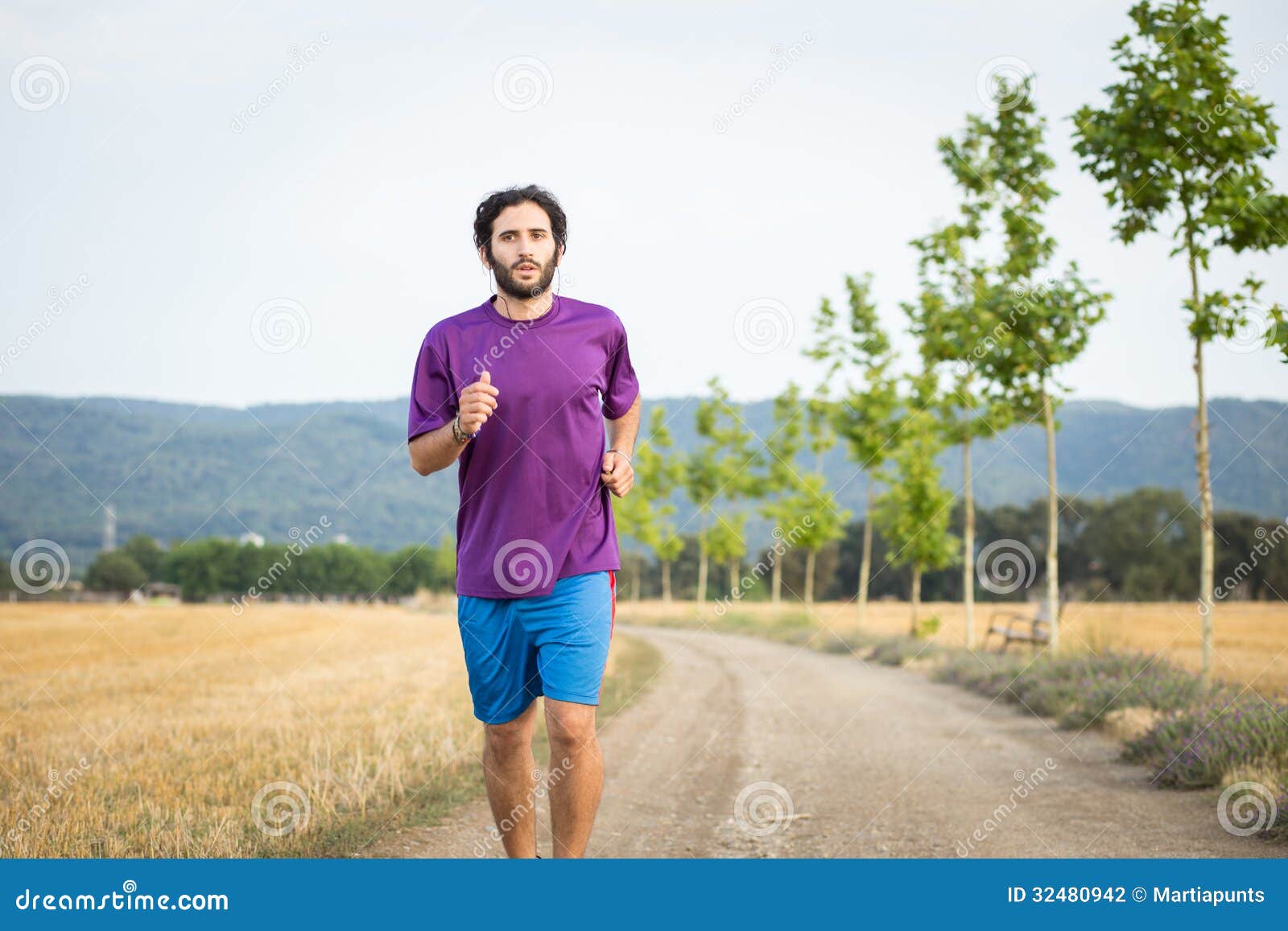 Young Man Running in the Nature Stock Photo - Image of nature ...