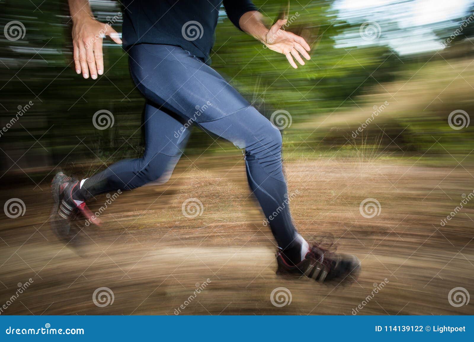 Young Man Running Outdoors in a Forest, Going Fast Stock Photo - Image ...