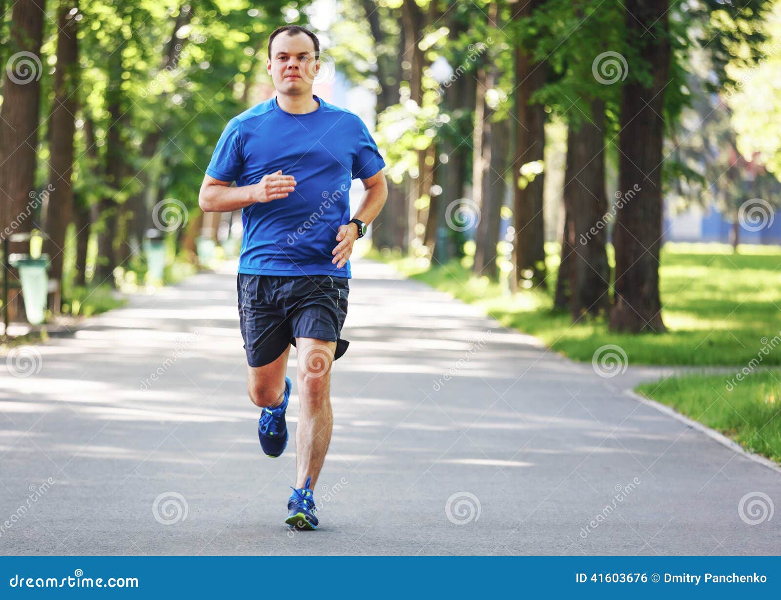 Young man running outdoors stock photo. Image of nature - 41603676