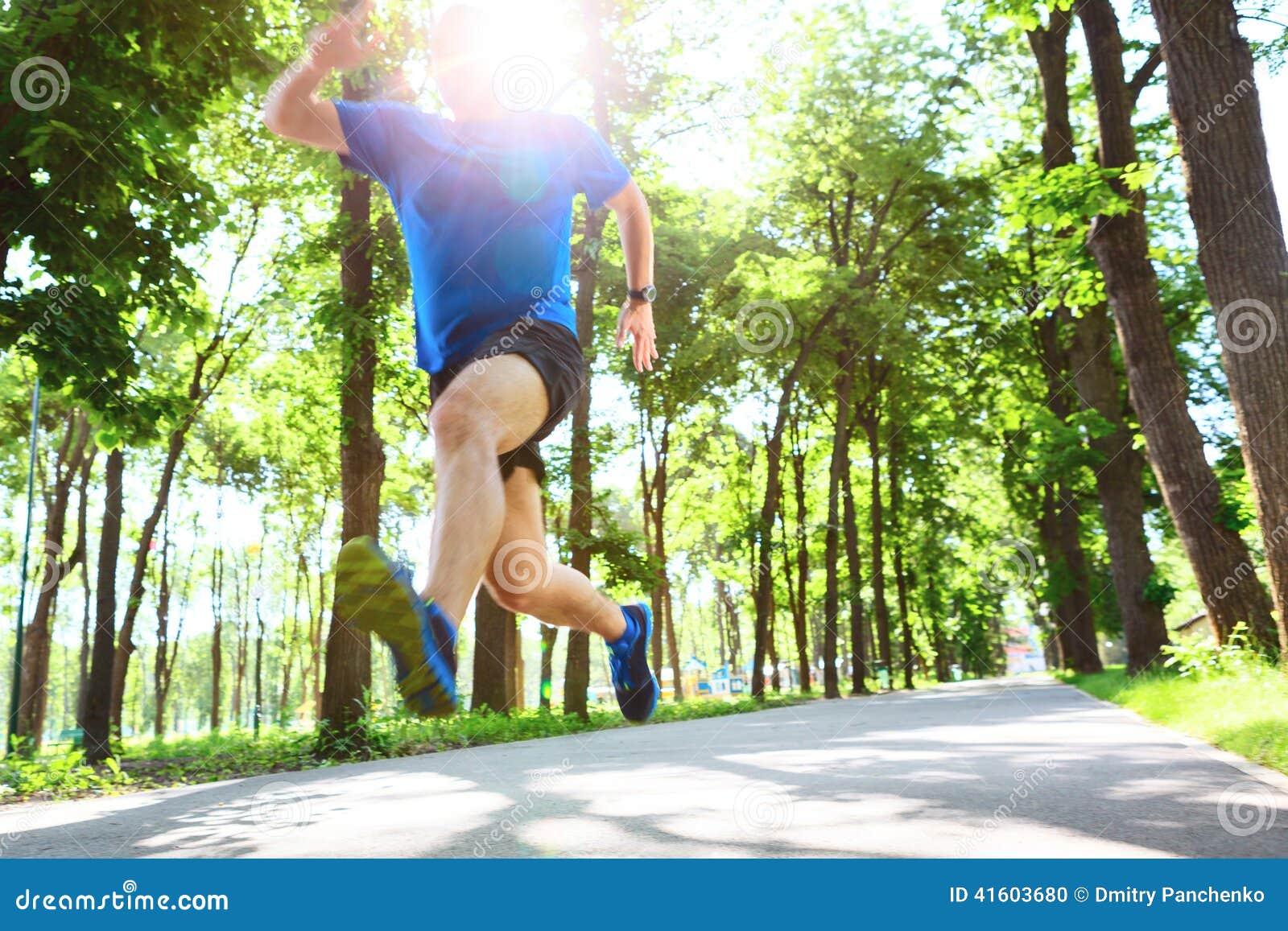 Young man running outdoors stock photo. Image of sport - 41603680