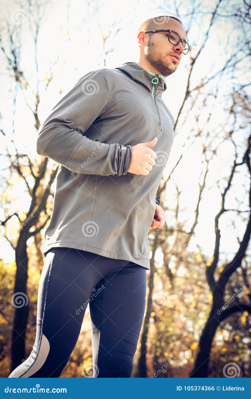 Young Man Running Outside. on the Move Stock Photo - Image of person ...