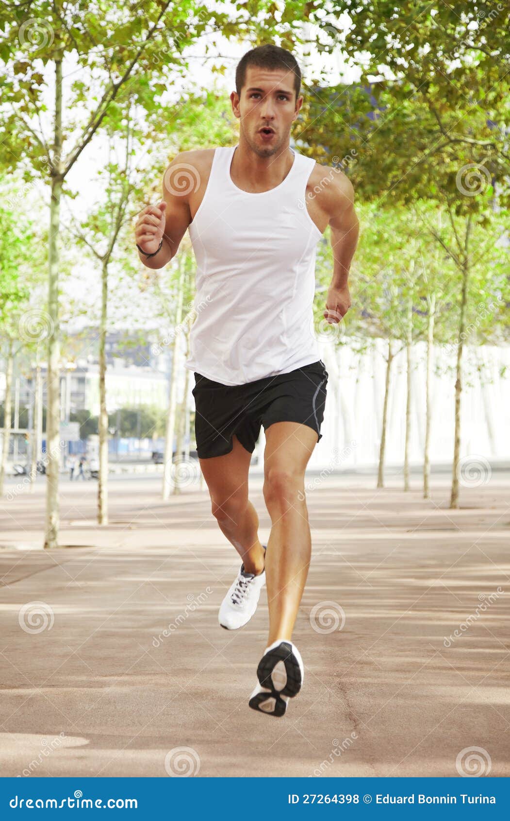 Young Man Running in the Park Stock Photo - Image of casual, active ...