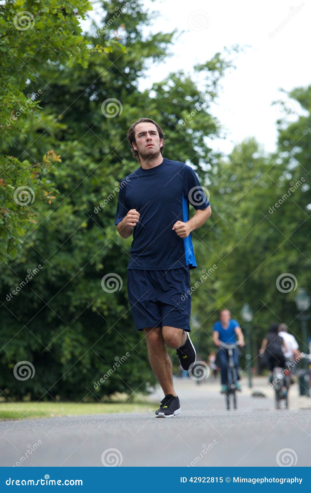 Young Man Running in the Park Stock Image - Image of jogger, full: 42922815