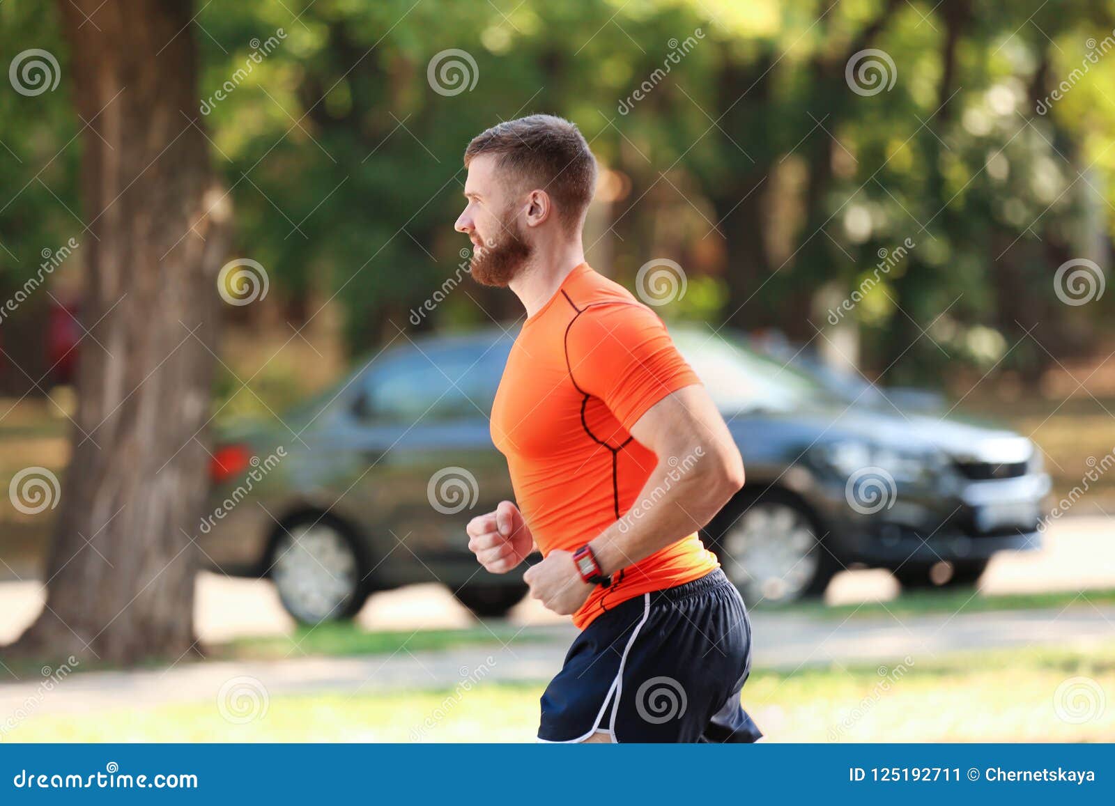 Young man running in park stock image. Image of motivation - 125192711