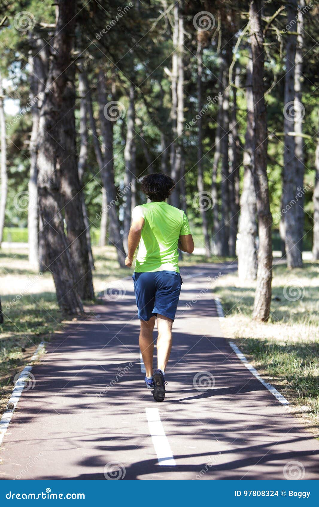Young Man Running in the Park Stock Photo - Image of practicing ...