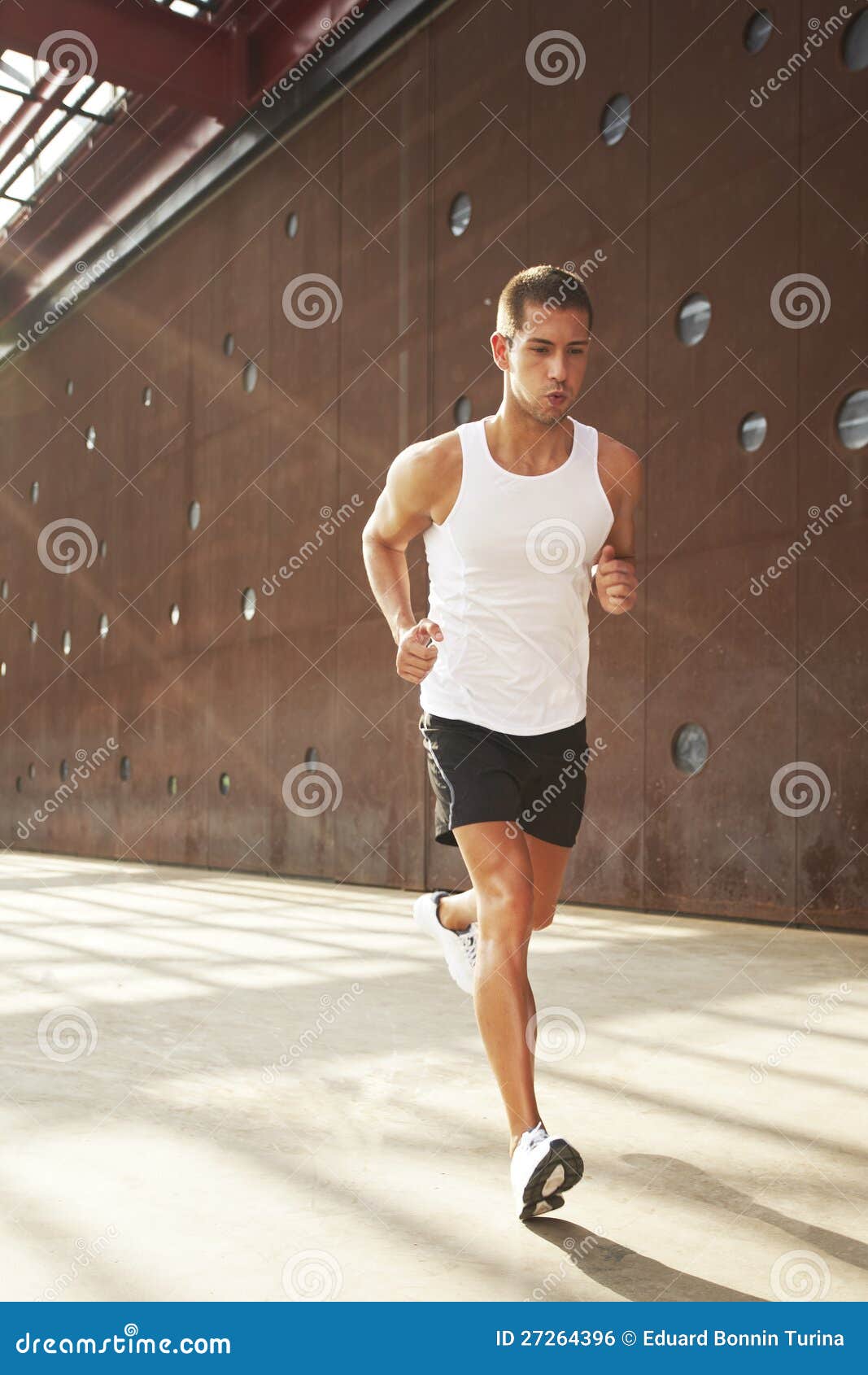 Young Man Running on the Street Stock Photo - Image of casual, jogger ...