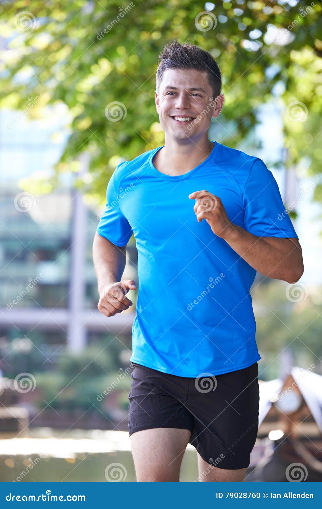 Young Man Running in Urban Setting Stock Photo - Image of vitality ...