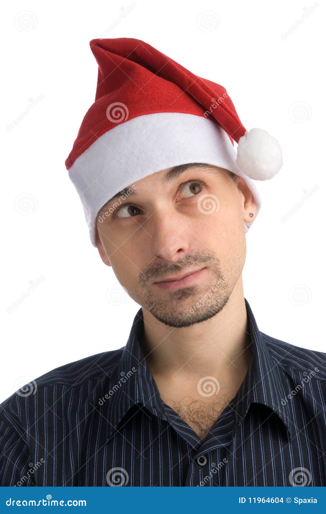 Young man in a Santa hat stock photo. Image of thinking - 11964604