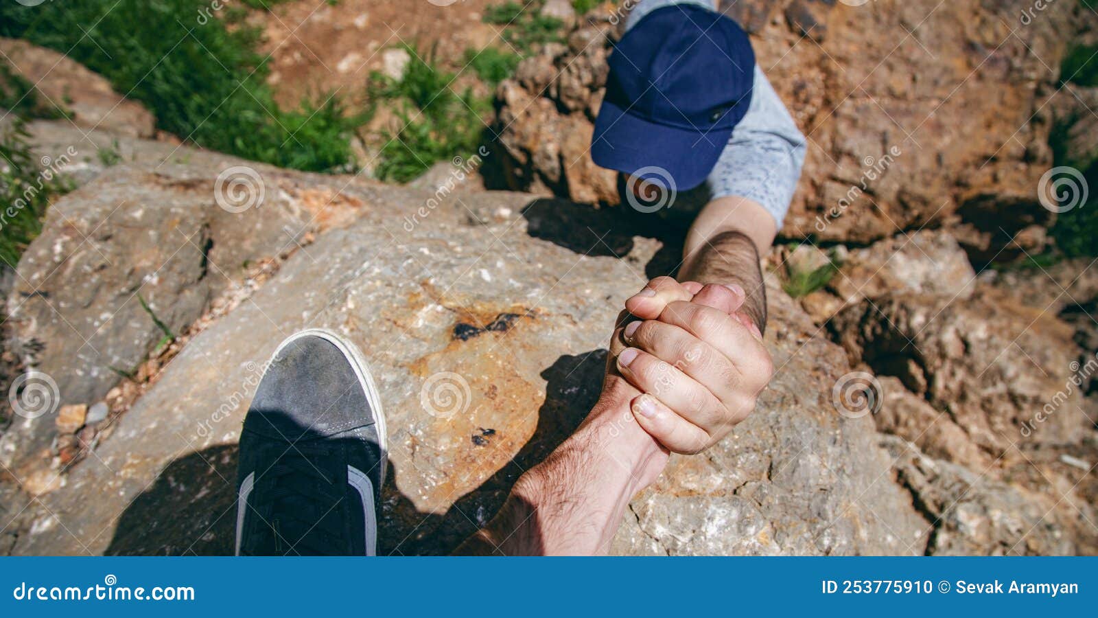 Man Saving Other By Griping The Forearm Rescuing And Helping Concept ...