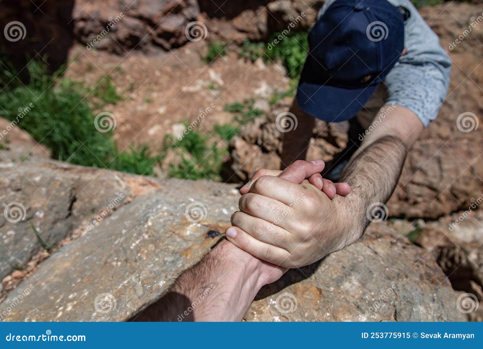 Man Saving Other By Griping The Forearm Rescuing And Helping Concept ...
