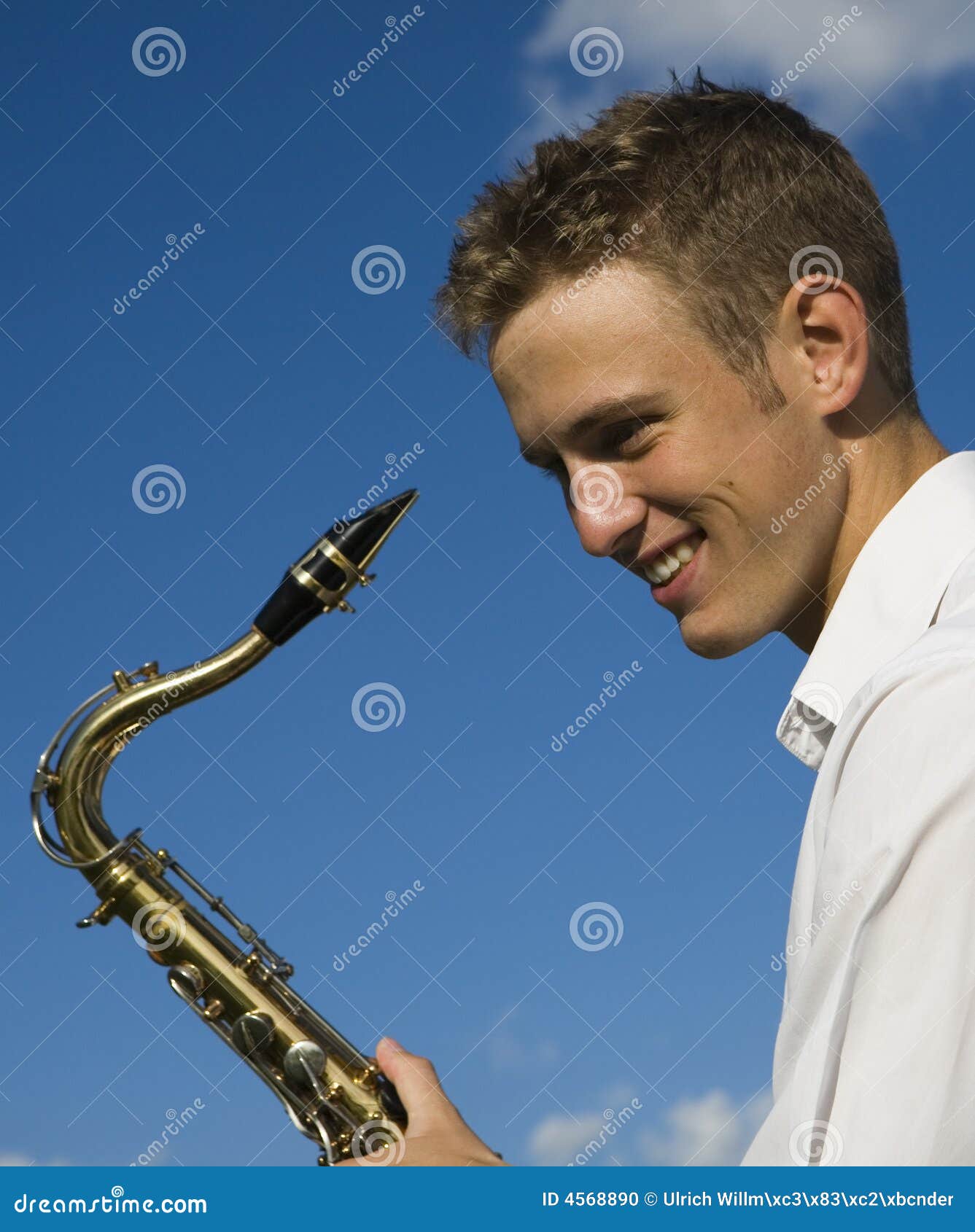 Young man with saxophone stock photo. Image of instrument - 4568890