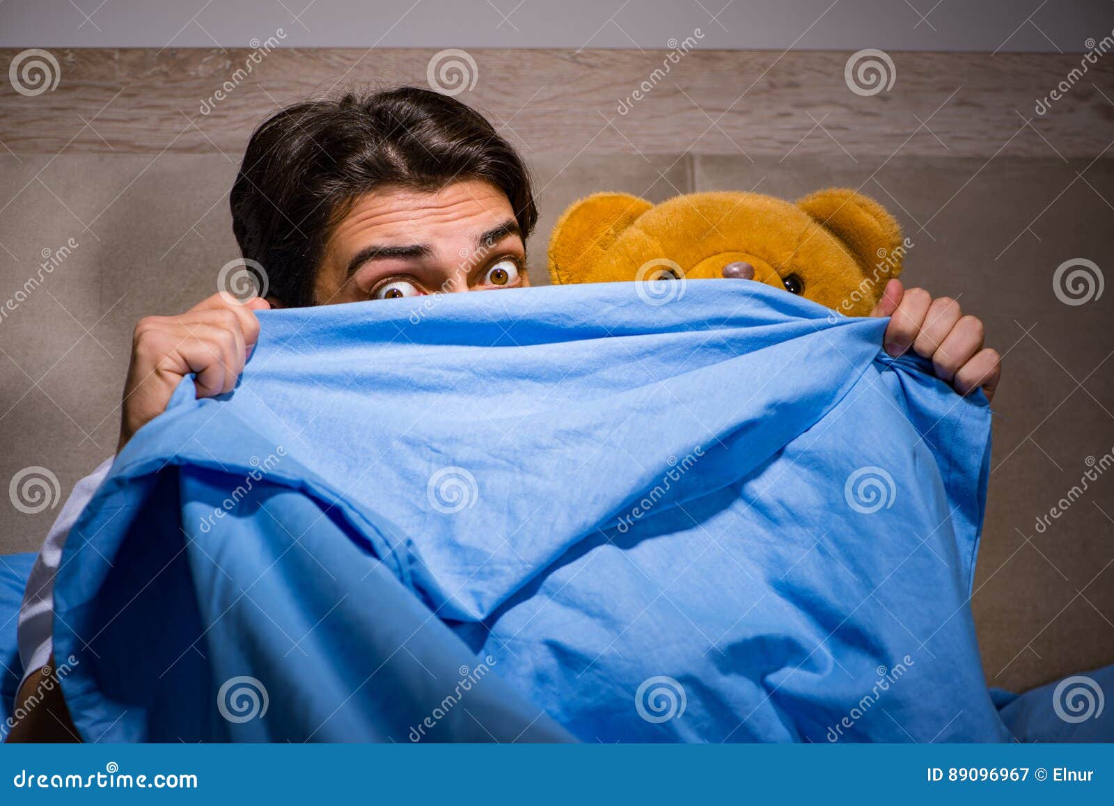 The Young Man Scared in Bed Stock Image - Image of morning, bedtime ...