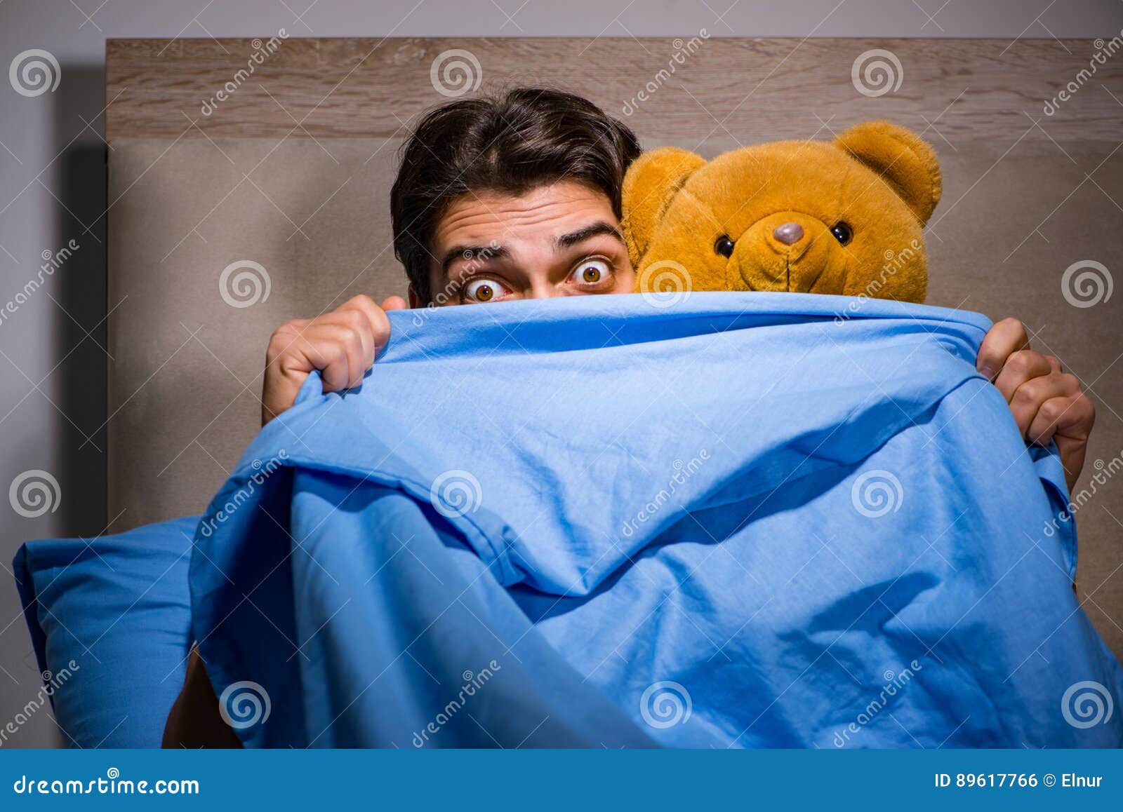 The Young Man Scared in Bed Stock Photo - Image of fear, expression ...