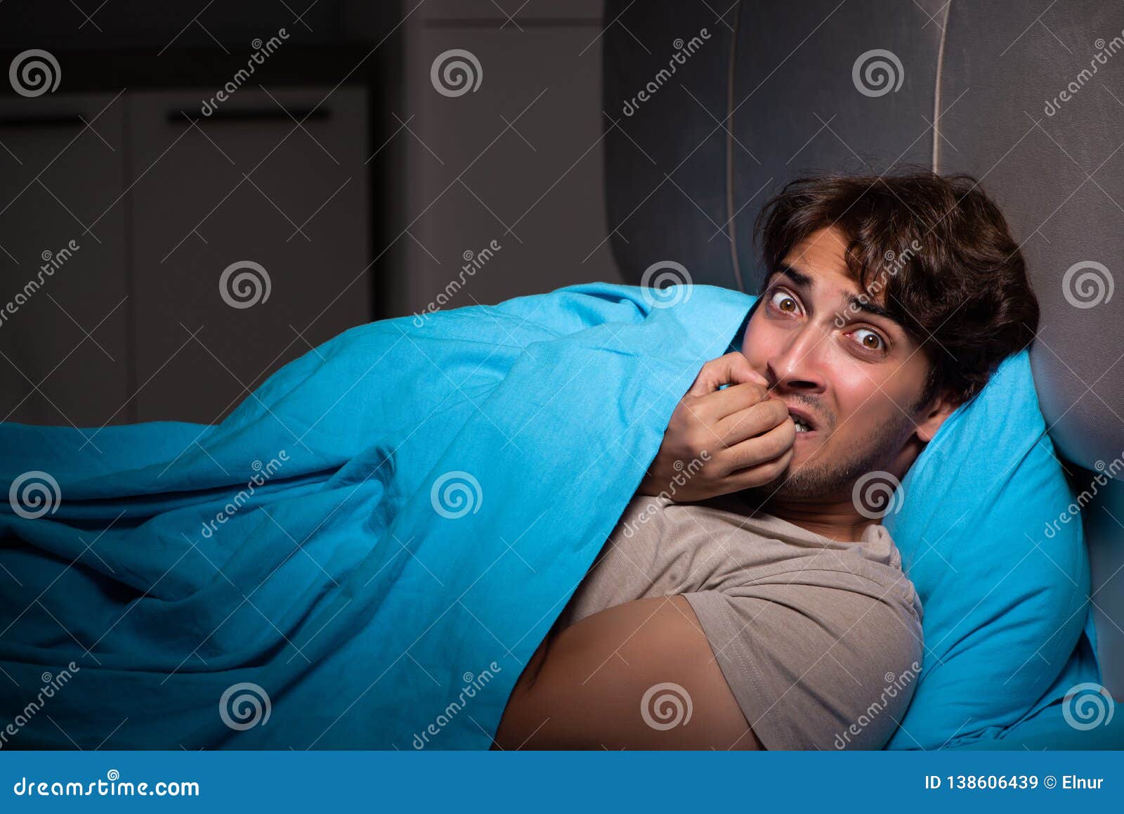 The Young Man Scared in His Bed Having Nightmares Stock Image - Image ...