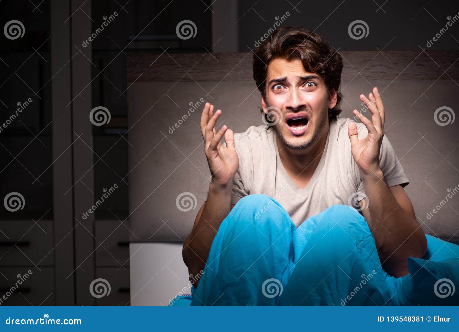 The Young Man Scared in His Bed Having Nightmares Stock Image - Image ...