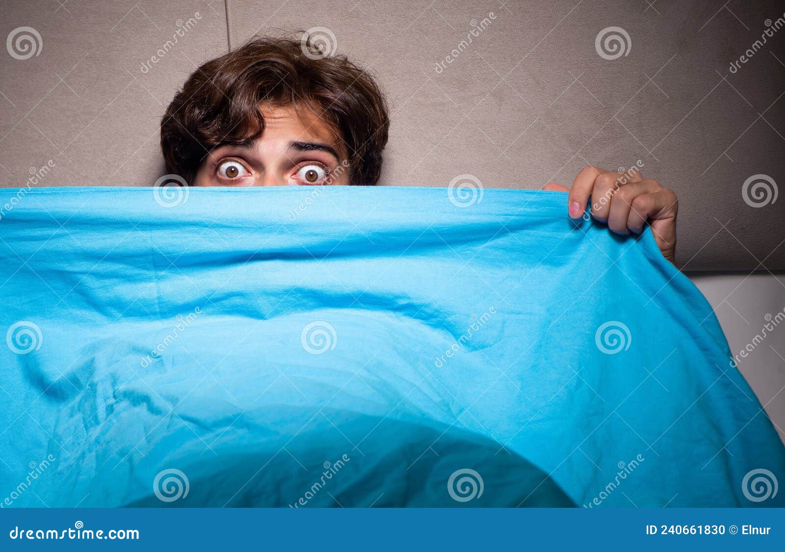 The Young Man Scared in His Bed Having Nightmares Stock Photo - Image ...