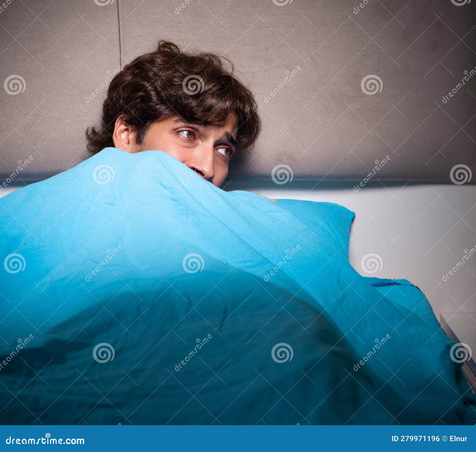 Young Man Scared in His Bed Having Nightmares Stock Photo - Image of ...