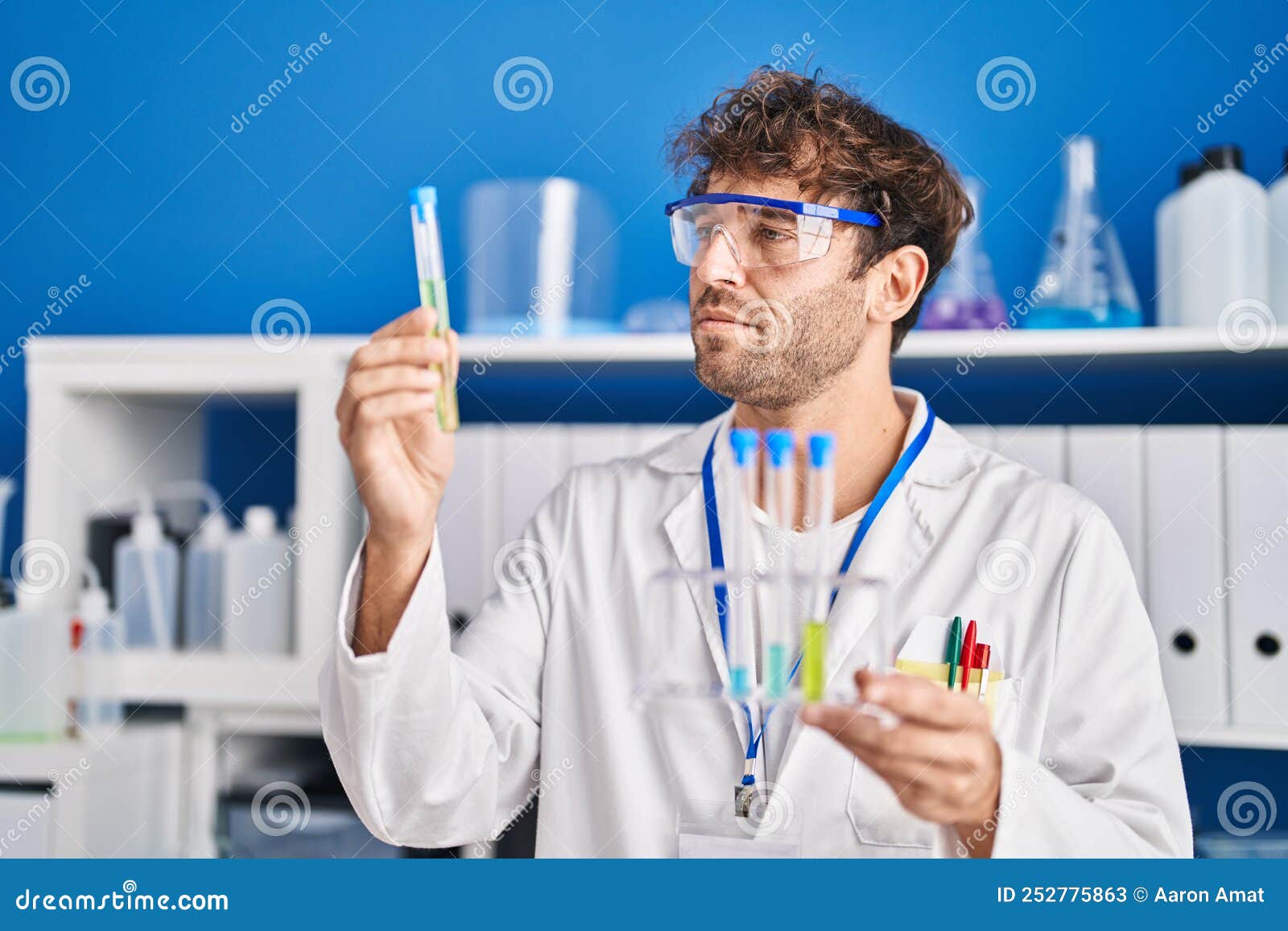 Young Man Scientist Holding Test Tubes at Laboratory Stock Image ...