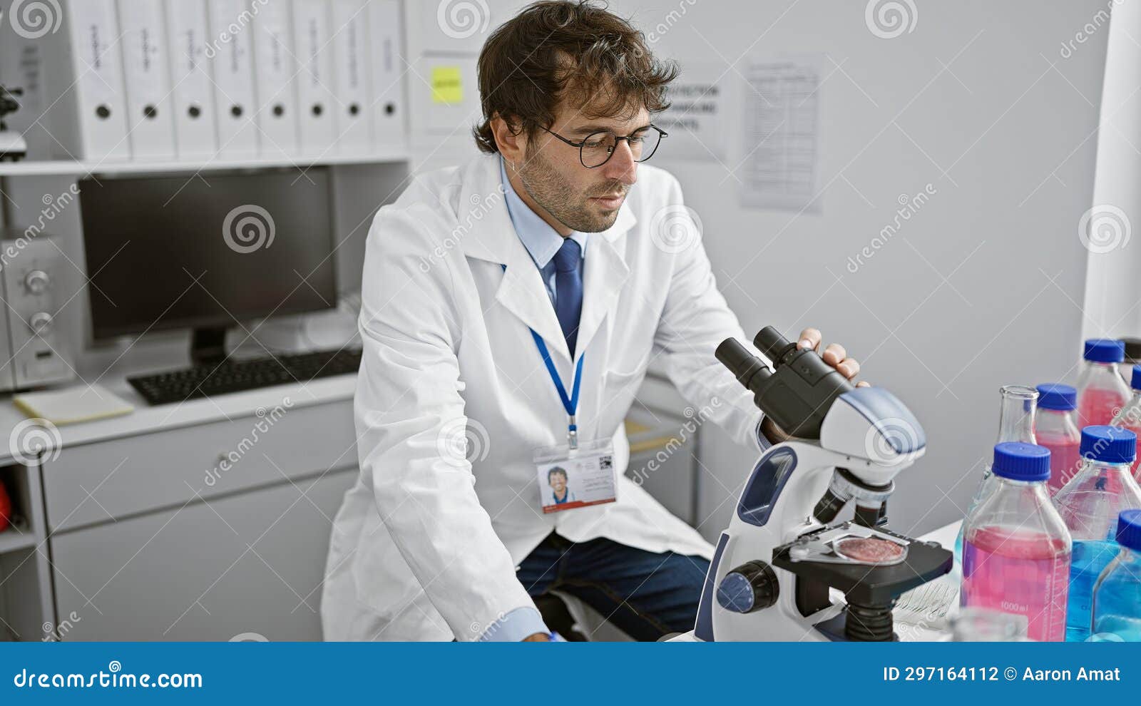 Young Man Scientist Using Microscope at Laboratory Stock Photo - Image ... Young Man Scientist Using Microscope at Laboratory Stock Photo - Image ...