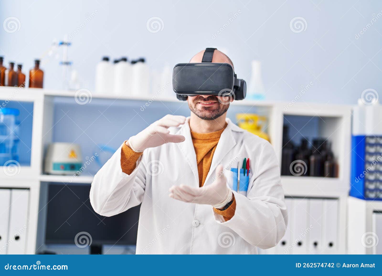 Young Man Scientist Using Virtual Reality Goggles at Laboratory Stock ... Young Man Scientist Using Virtual Reality Goggles at Laboratory Stock ...